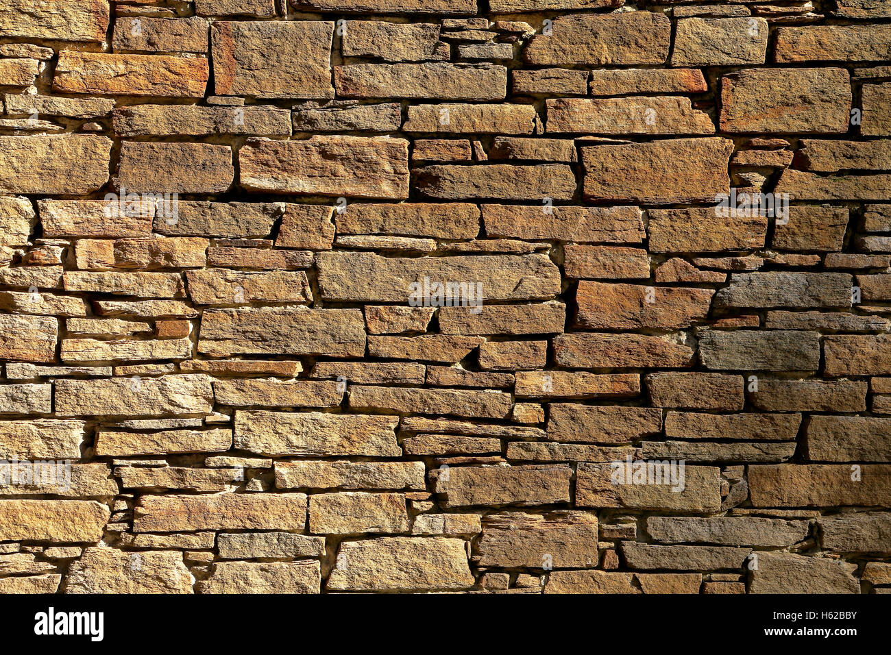 background brown rock wall design Stock Photo - Alamy
