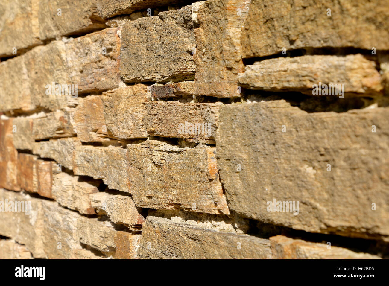 background brown rock wall design Stock Photo - Alamy