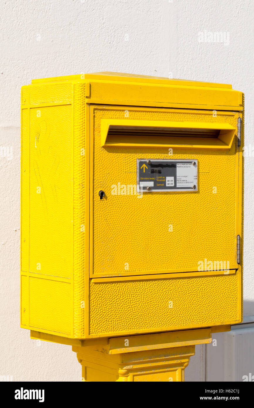 yellow letter Box in the street Stock Photo - Alamy