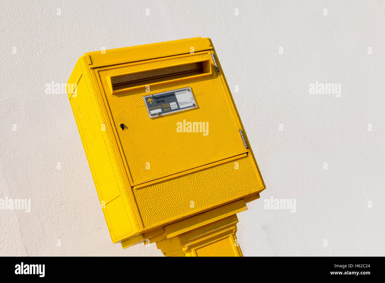 yellow letter Box in the street Stock Photo - Alamy