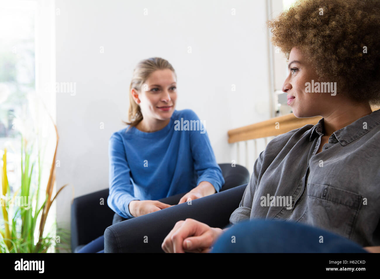 Two friends meeting Stock Photo - Alamy