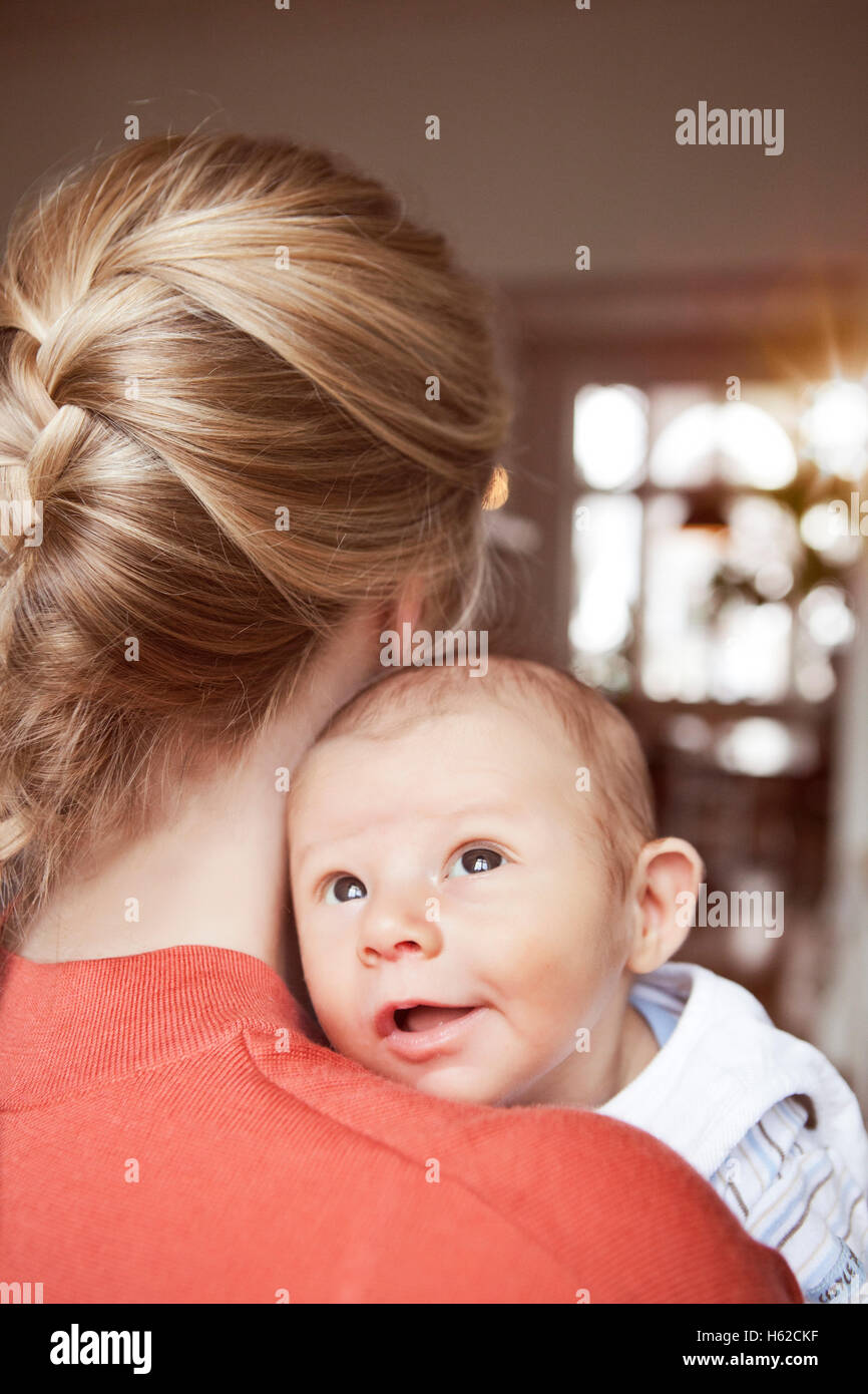 Carrying child over shoulder hi-res stock photography and images - Alamy