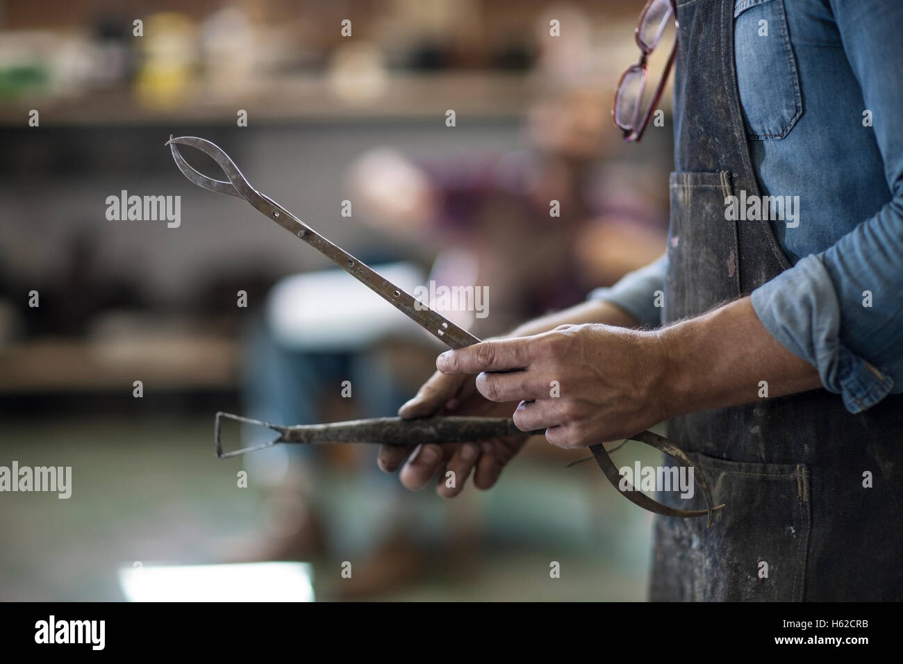 Man holding tools hi-res stock photography and images - Alamy