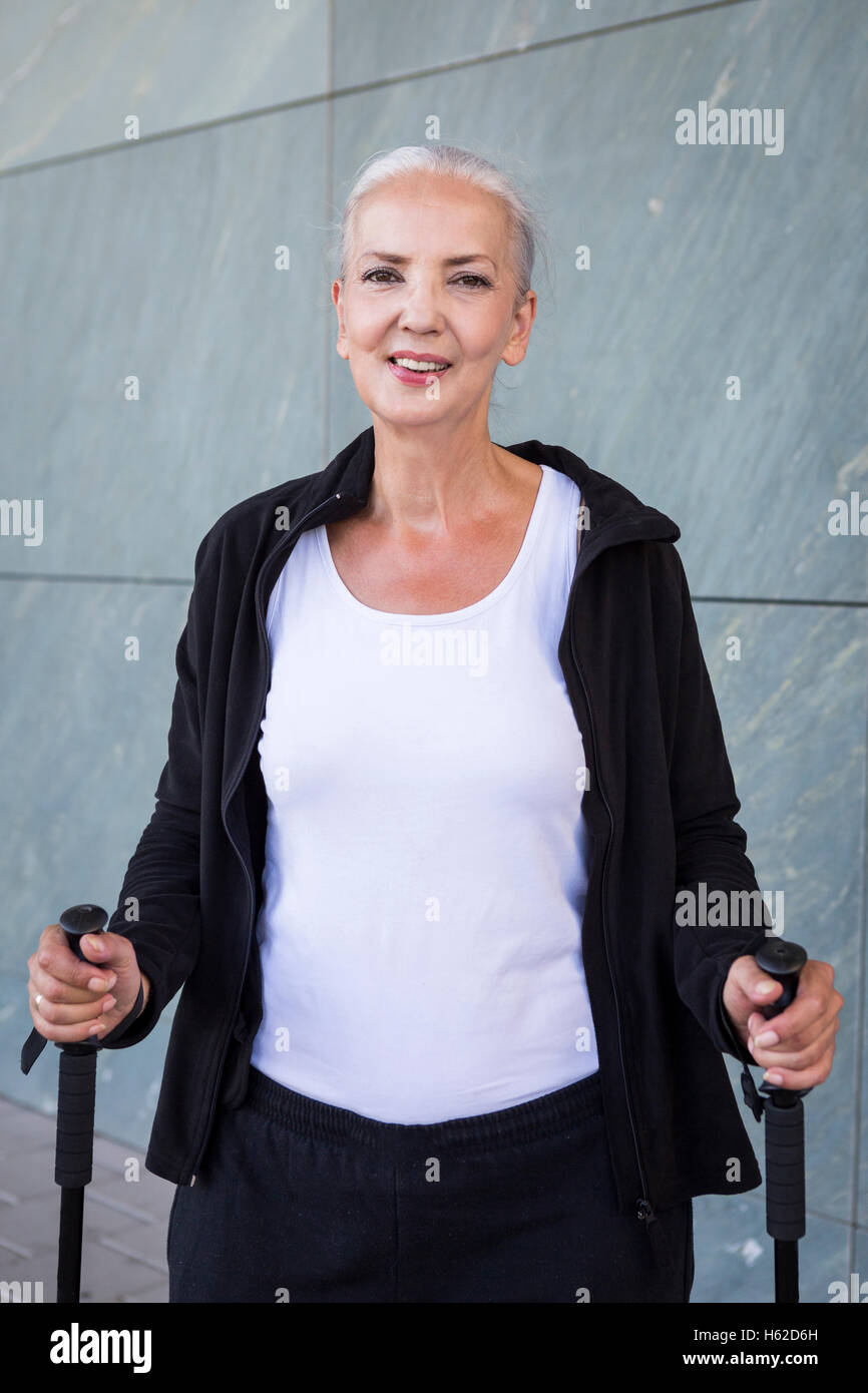 Beautiful mature woman sticks hi-res stock photography and images - Alamy