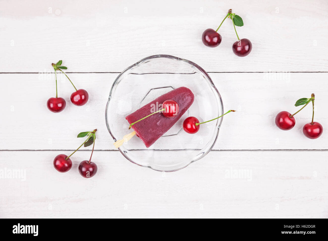 Sour cherry ice lollies and cherries Stock Photo - Alamy