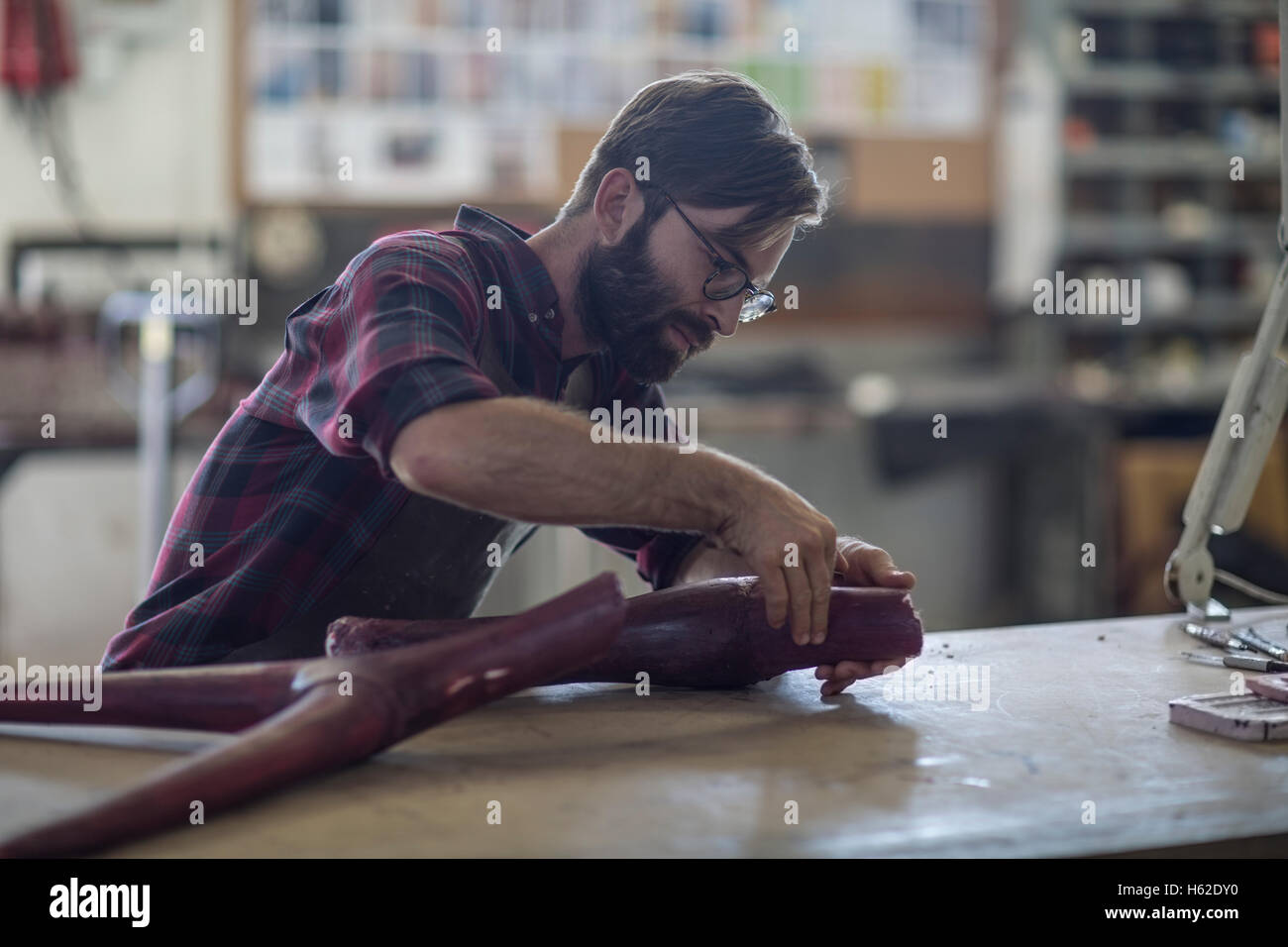 Sculptor working in studio Stock Photo - Alamy