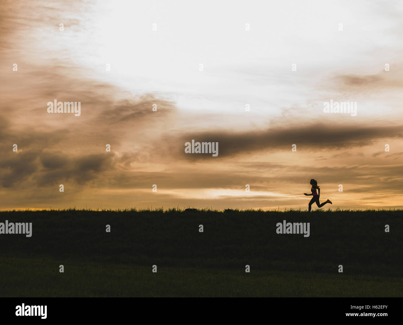 Running woman silhouette hi-res stock photography and images - Alamy