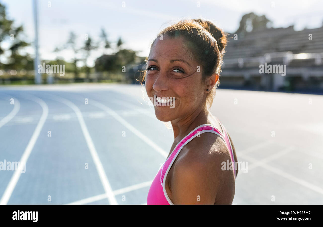 Portrait of a smiling athlete Stock Photo - Alamy