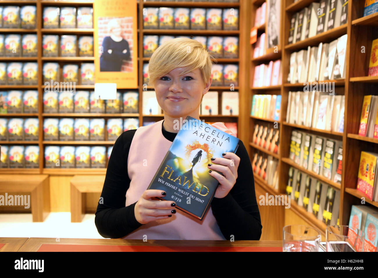 Frankfurt, Germany. 22nd Oct, 2016. Cecelia Ahern signs copies of her ...