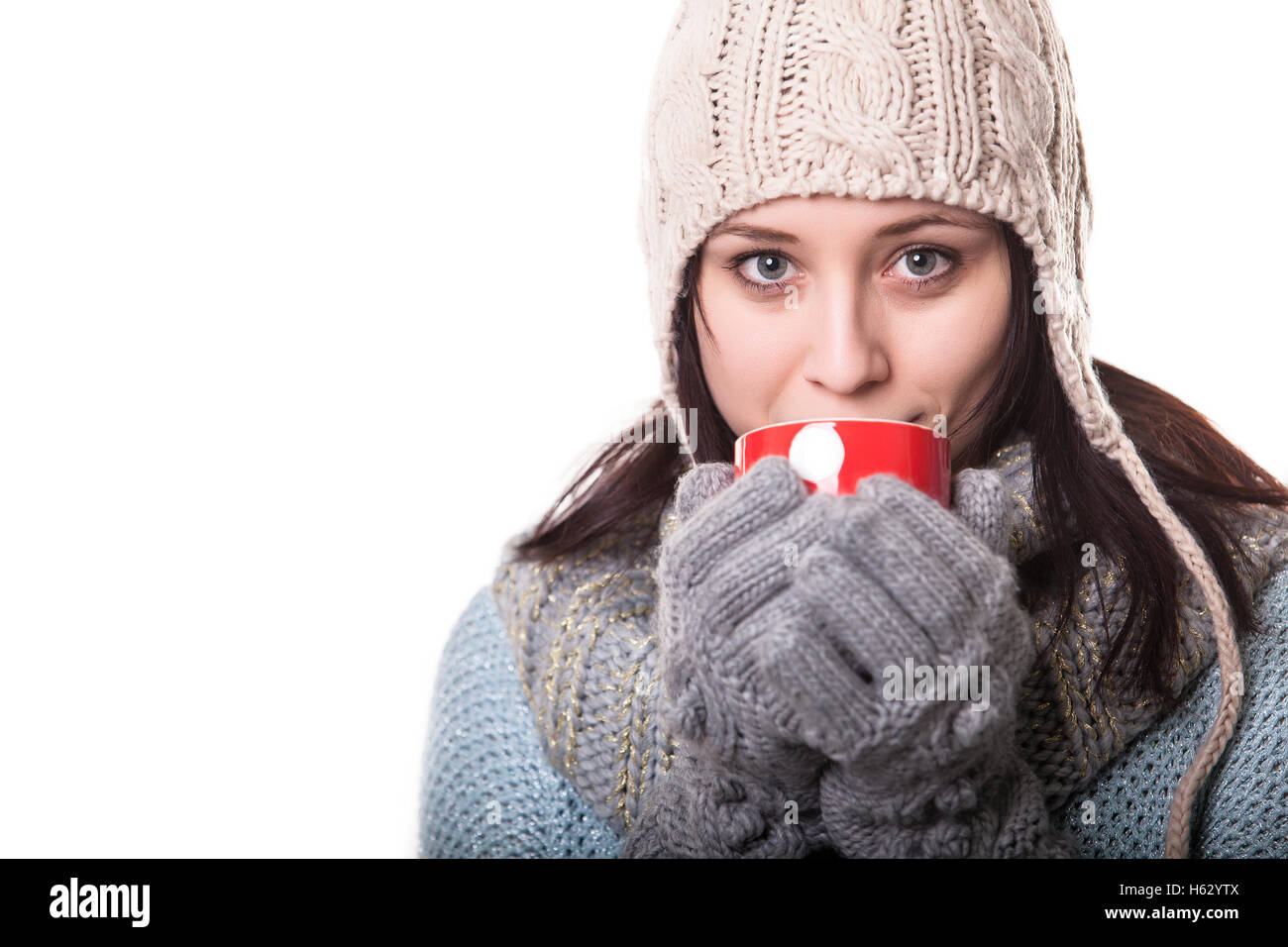 portrait of a beautiful woman drinking tea, isolated on white ...