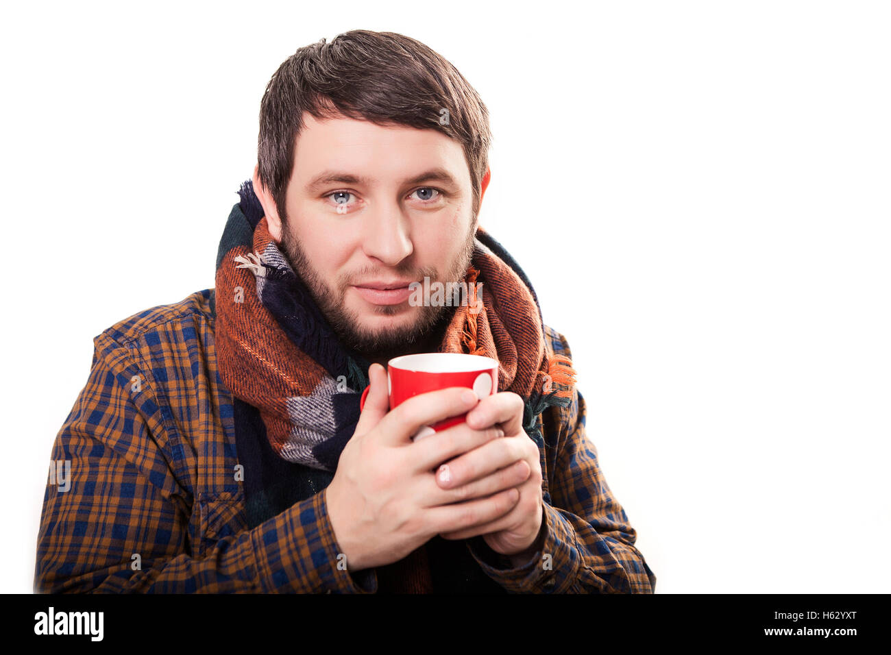 Man having cup of tea on white background Stock Photo - Alamy