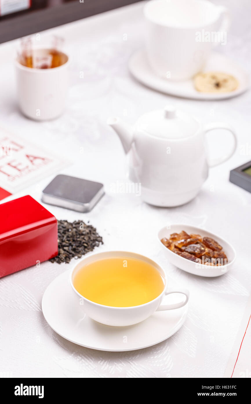 Tea time concept, cup of tea with sugar rocks Stock Photo - Alamy