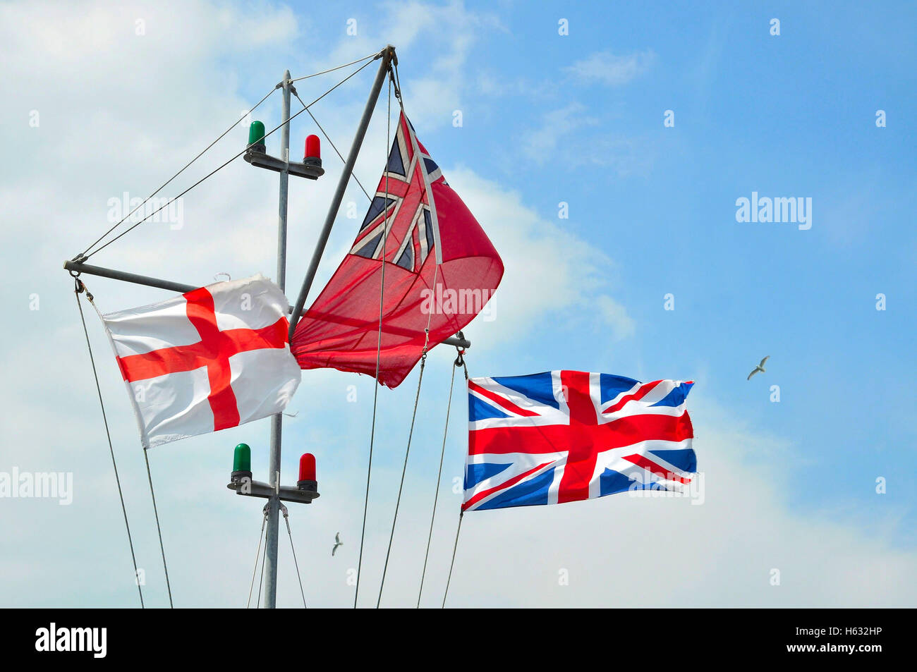 St Geoge’s Cross, the Merchant Navy Ensign and the Union Jack Flags on ...