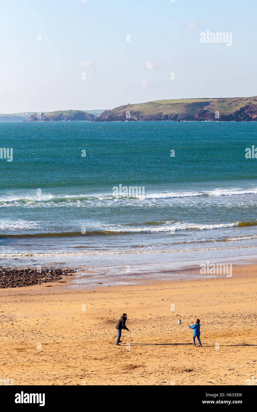 Father and son on Freshwater West beach, Pembrokeshire, Wales, UK Stock ...