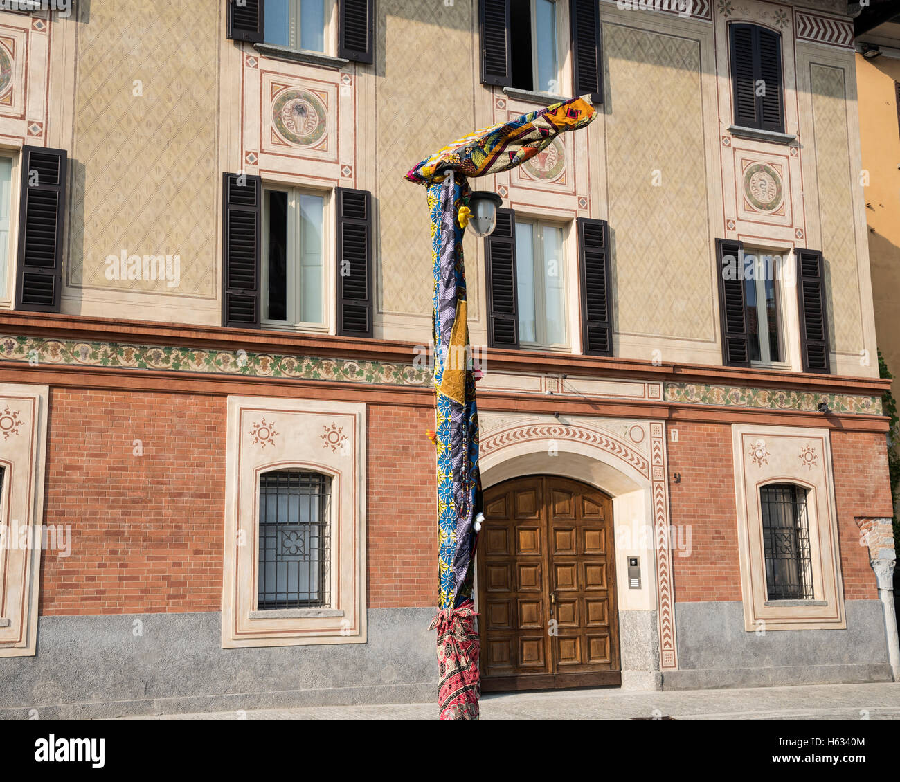 Symbolic colored pillar in front of beautiful ancient house, Verona ...