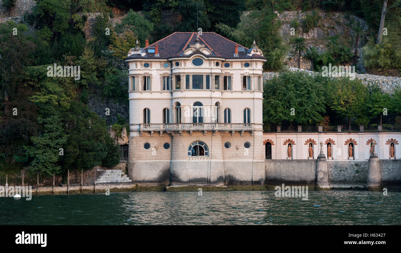 Beautiful building on the lake Como shore, southern tip of Lake Como ...