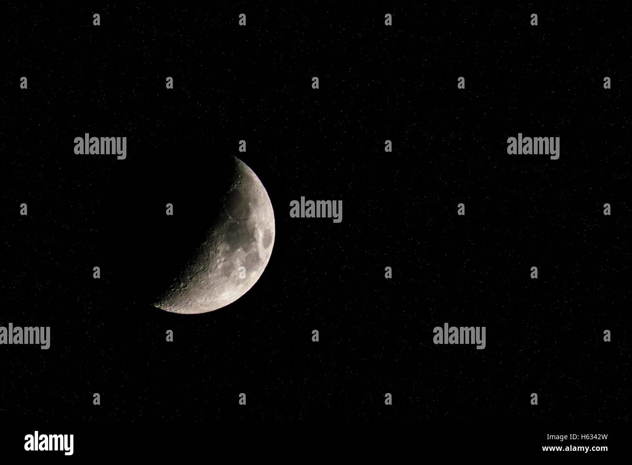 Crescent moon surrounded by millions of bright stars Stock Photo - Alamy