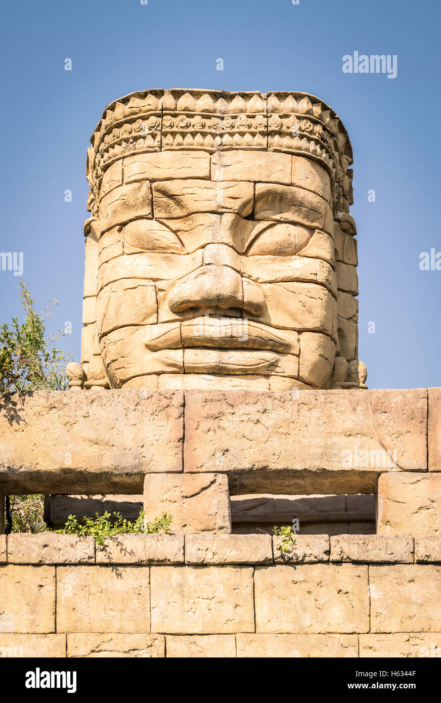 Stone face of a temple in the forest Stock Photo - Alamy