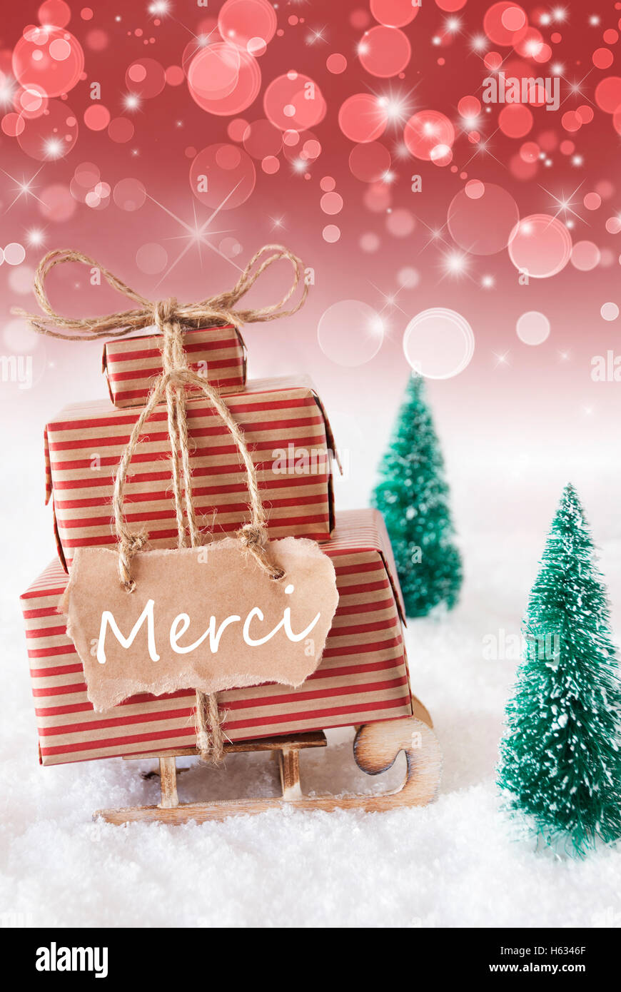 Vertical Christmas Sleigh, Red Background, Merci Means Thank You Stock ...