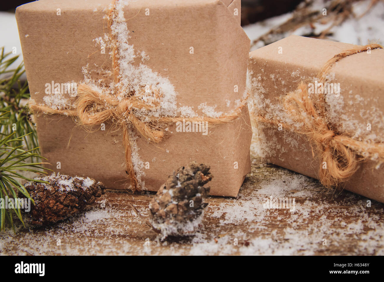 Christmas gifts box presents on brown Stock Photo - Alamy