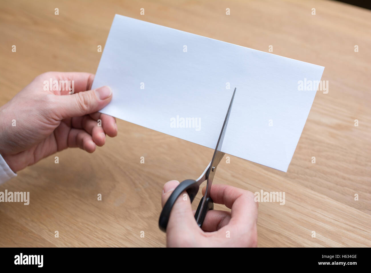 Cutting paper hi-res stock photography and images - Alamy