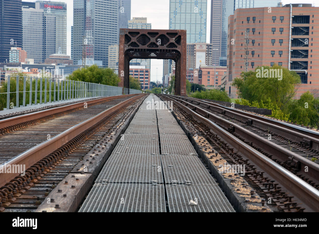 The elevated Union Pacific railroad tracks bridge the Trinity River ...
