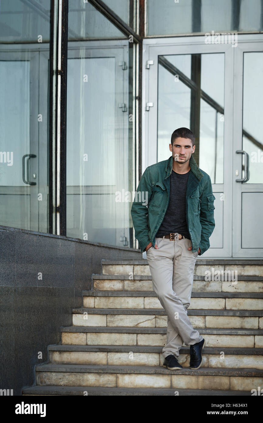 Men posing on the steps. Men beauty. Street fashion Stock Photo - Alamy