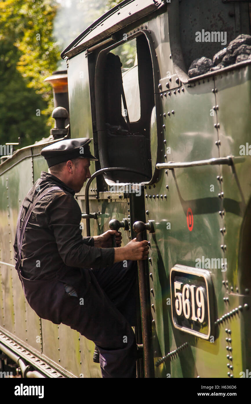 Driver and steam engine Stock Photo - Alamy