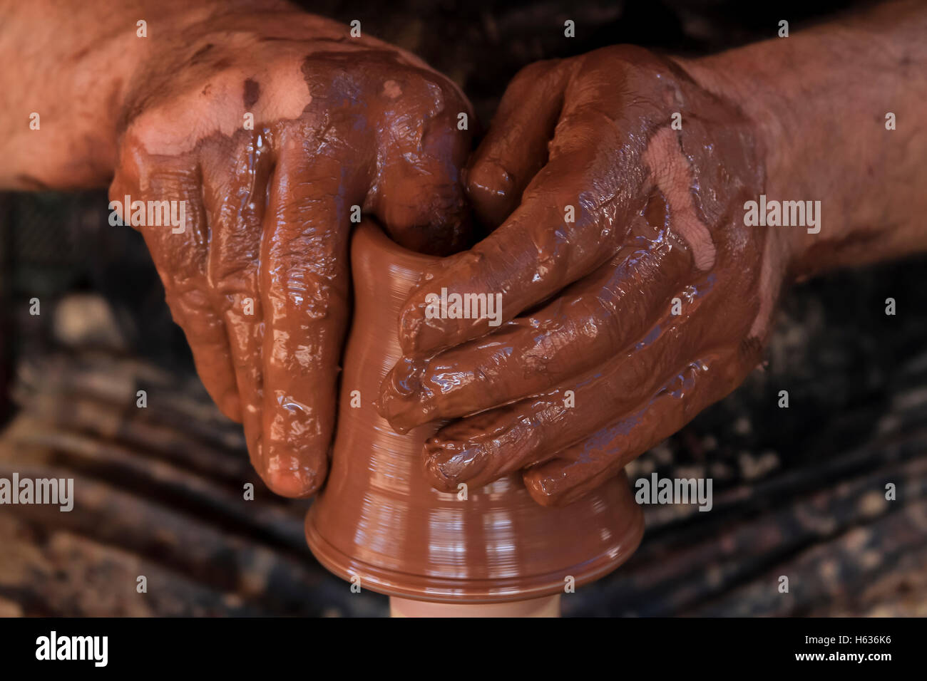 Master hands making clay hi-res stock photography and images - Alamy