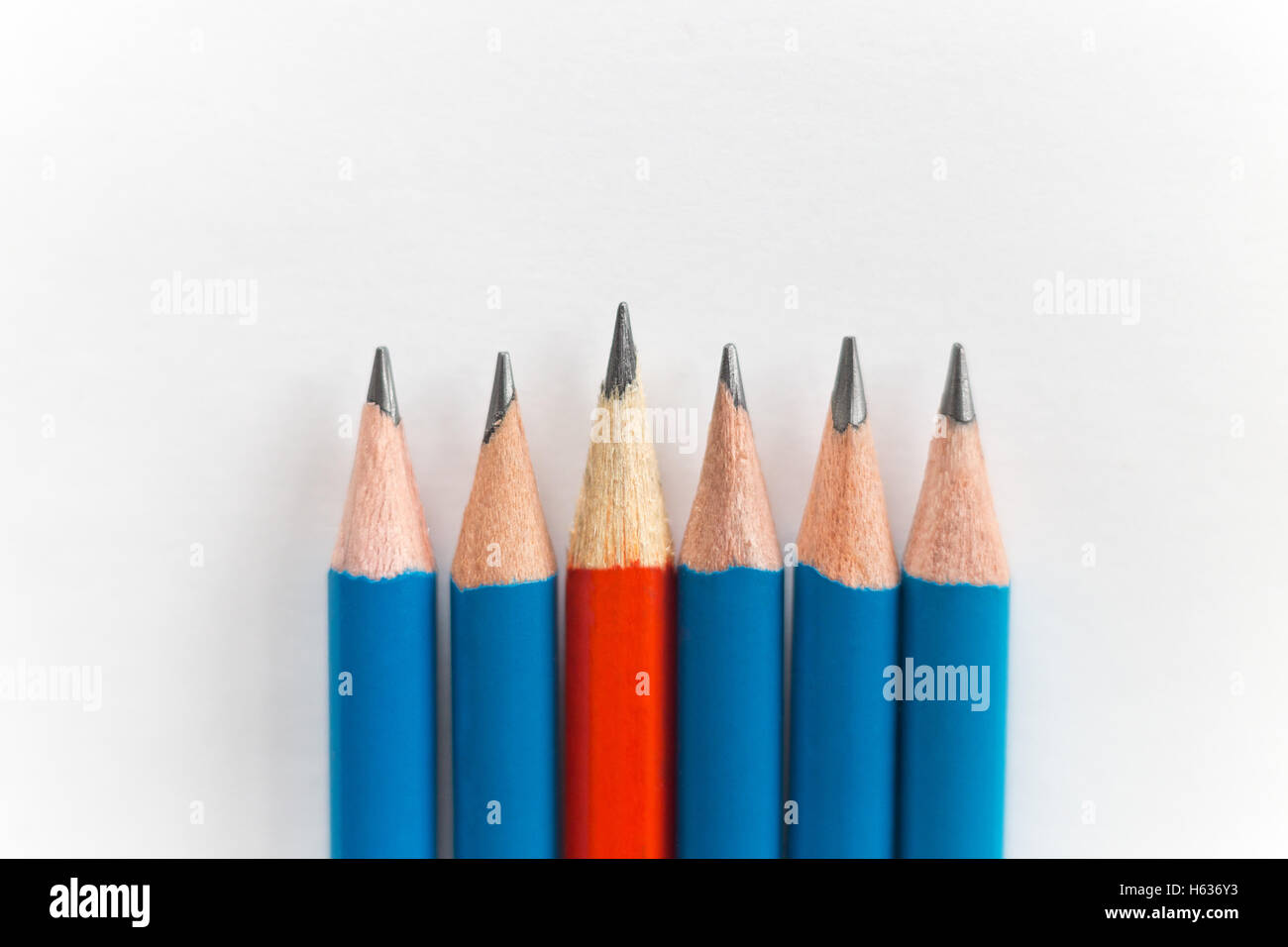 Simple sharp pencils isolated on white background, red among blue Stock ...