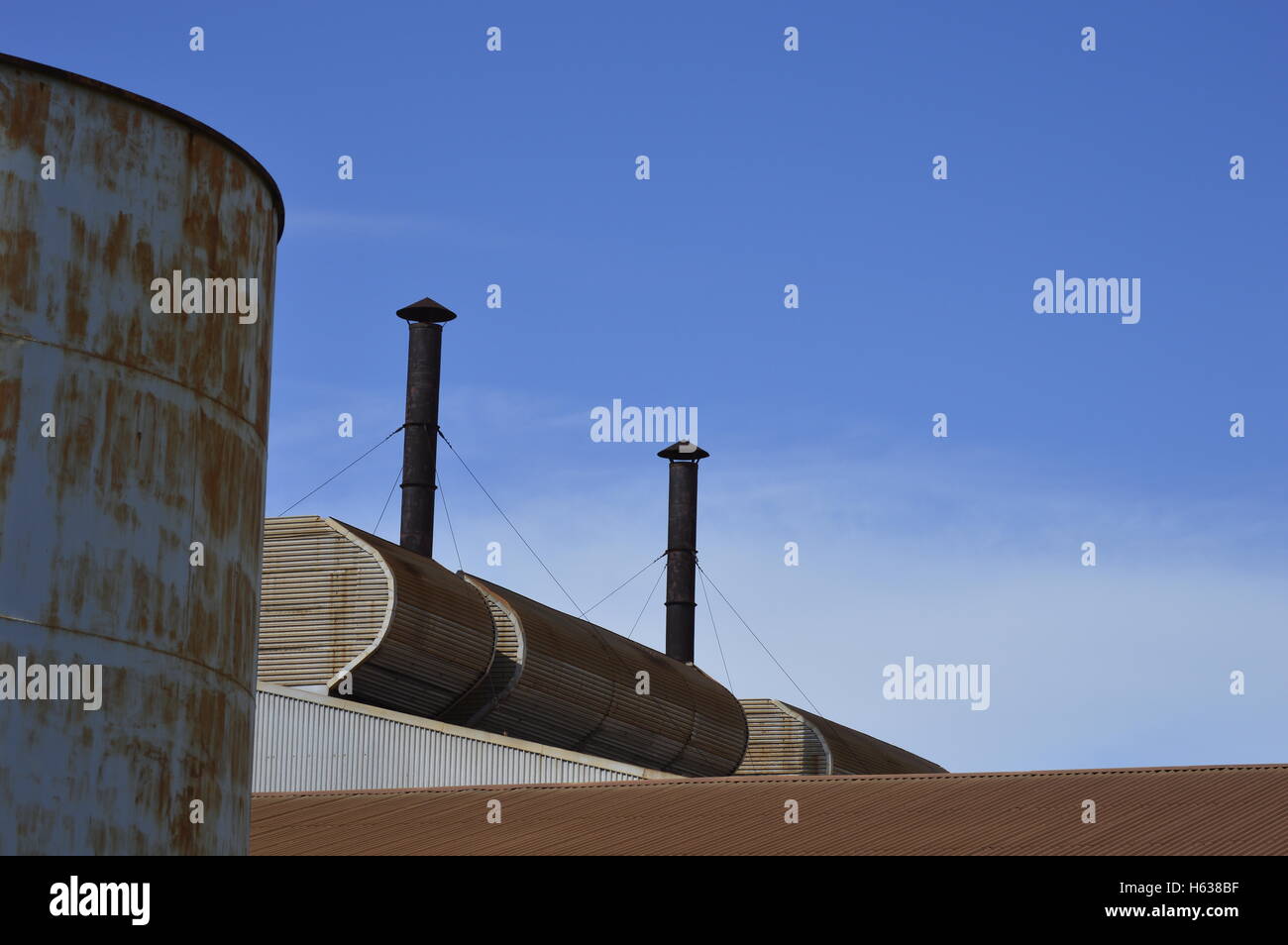 Smoke chimney of an industrial plant Stock Photo - Alamy