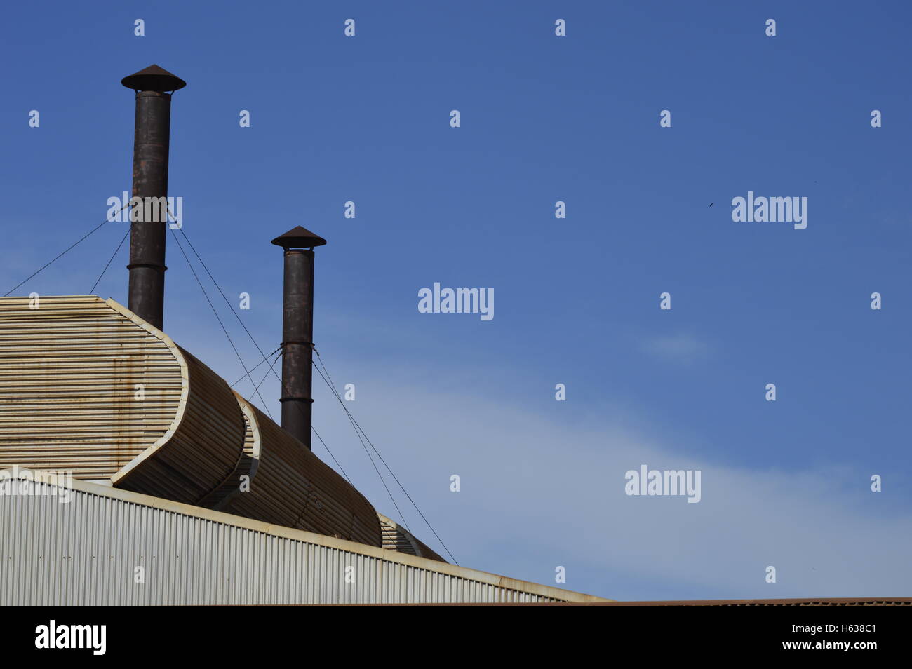Smoke chimney of an industrial plant Stock Photo - Alamy