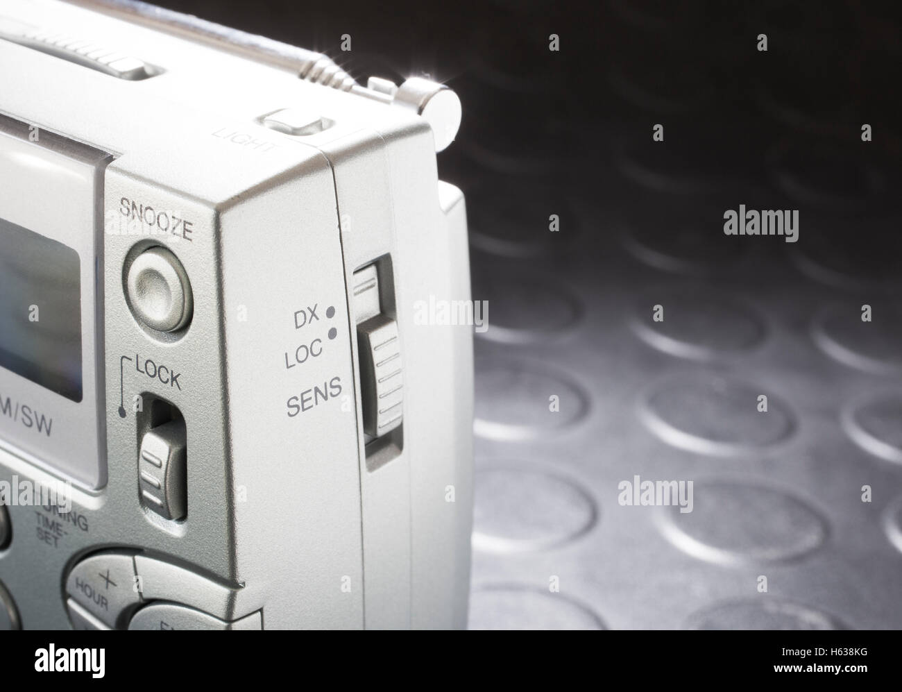 Switch on a battery powered emergency radio that helps tune in distant ...