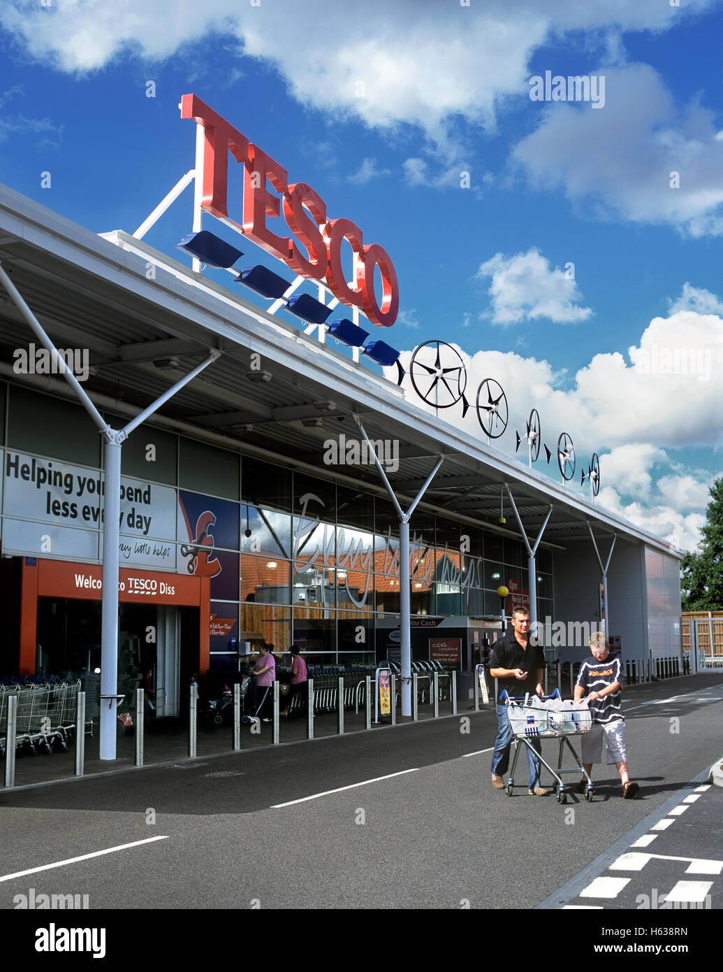 Wind turbines on the roof of a Tesco supermarket, Diss, Norfolk Stock ...