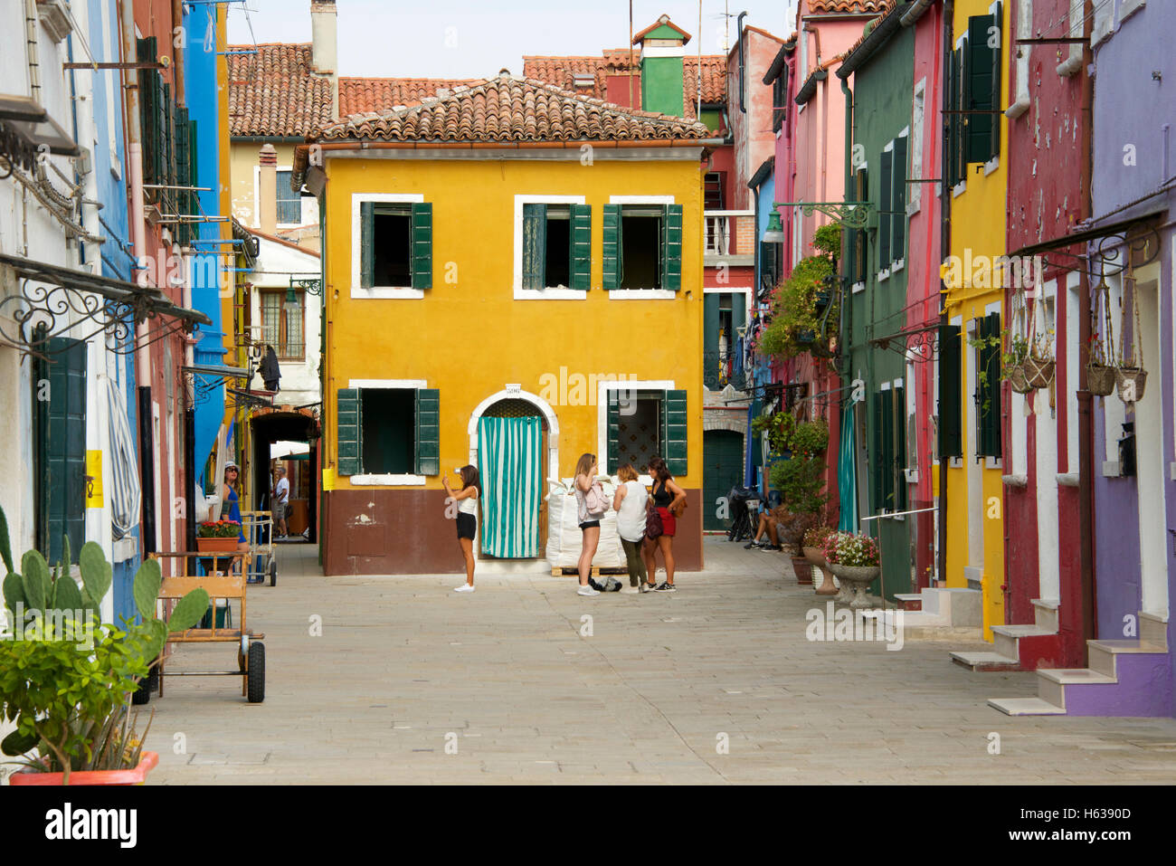 Scene of coloured homes, Burano, Italy Stock Photo - Alamy