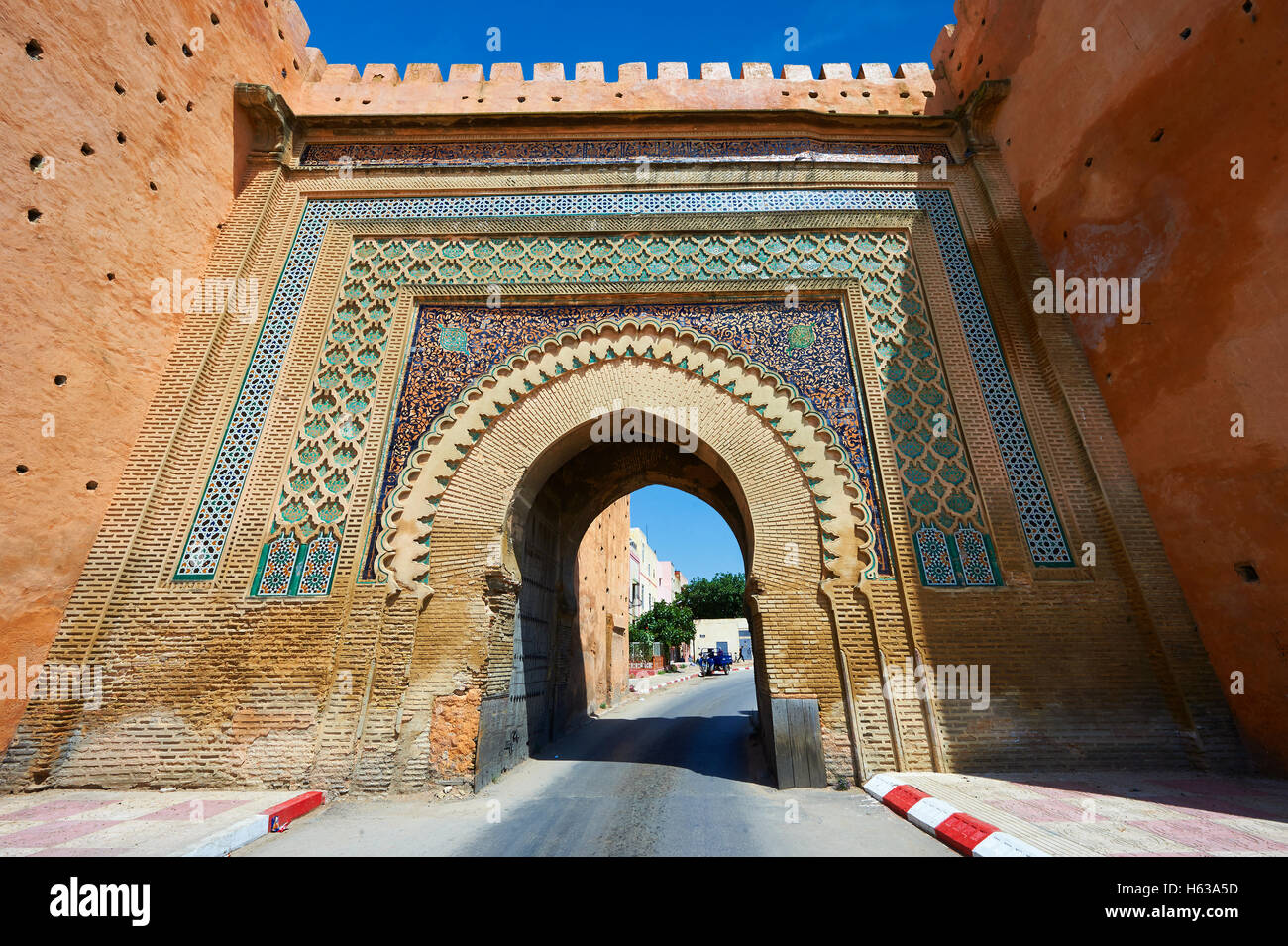 Moorish Arabesque Gate in the city walls of Meknes with zellij mosaics ...