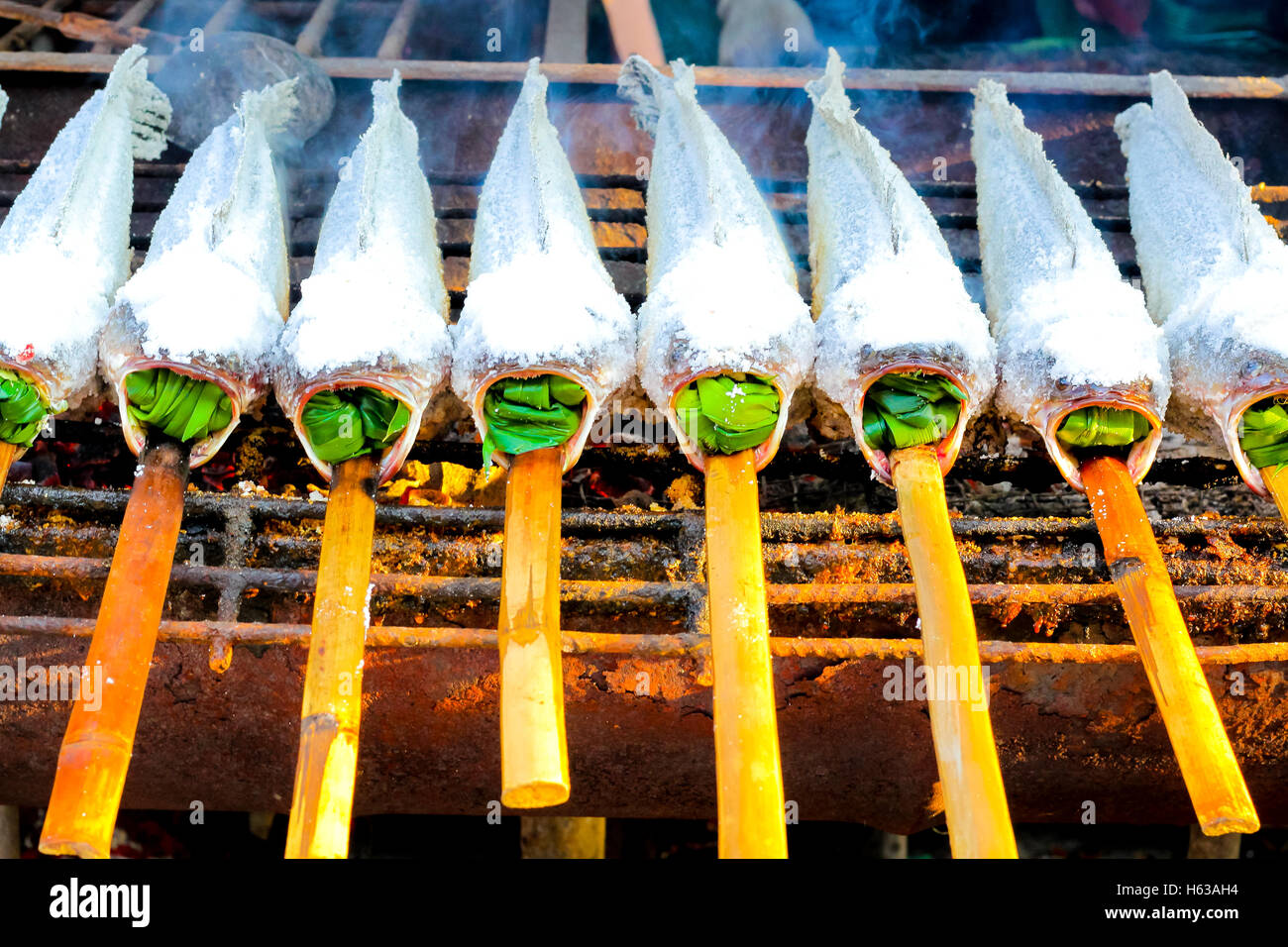 grilled fish with salt Stock Photo - Alamy