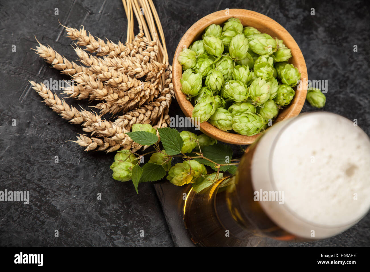 Beer glass on dark background Stock Photo - Alamy
