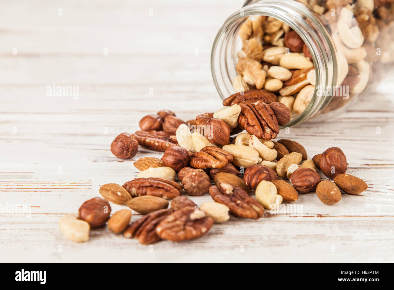 Mix of different nuts closeup photo Stock Photo - Alamy