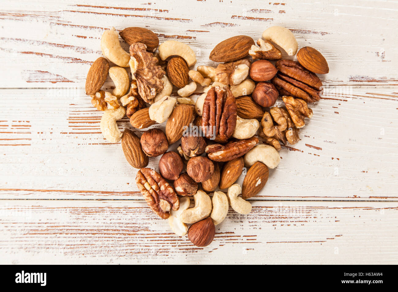 Mix of different nuts closeup photo Stock Photo - Alamy
