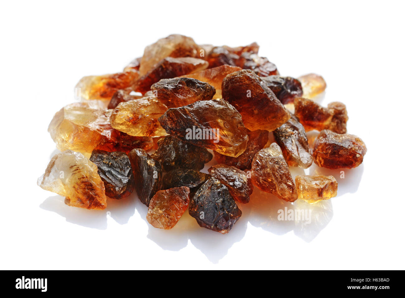 Caramelized sugar closeup isolated on white background Stock Photo - Alamy