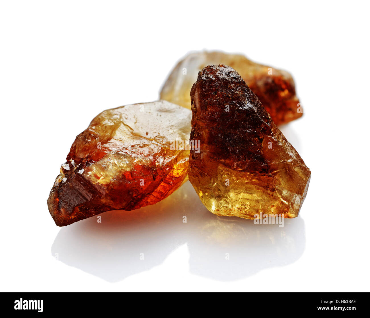 Caramelized sugar closeup isolated on white background Stock Photo - Alamy