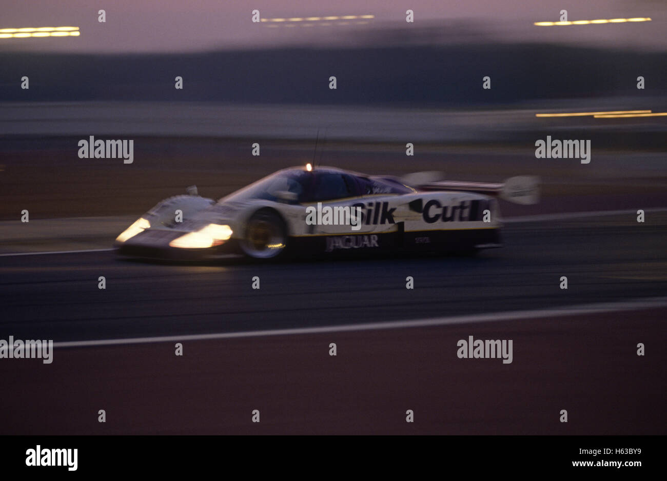No 1 Jaguar XJR9 LM racing at dusk at Le Mans 1989 Stock Photo - Alamy