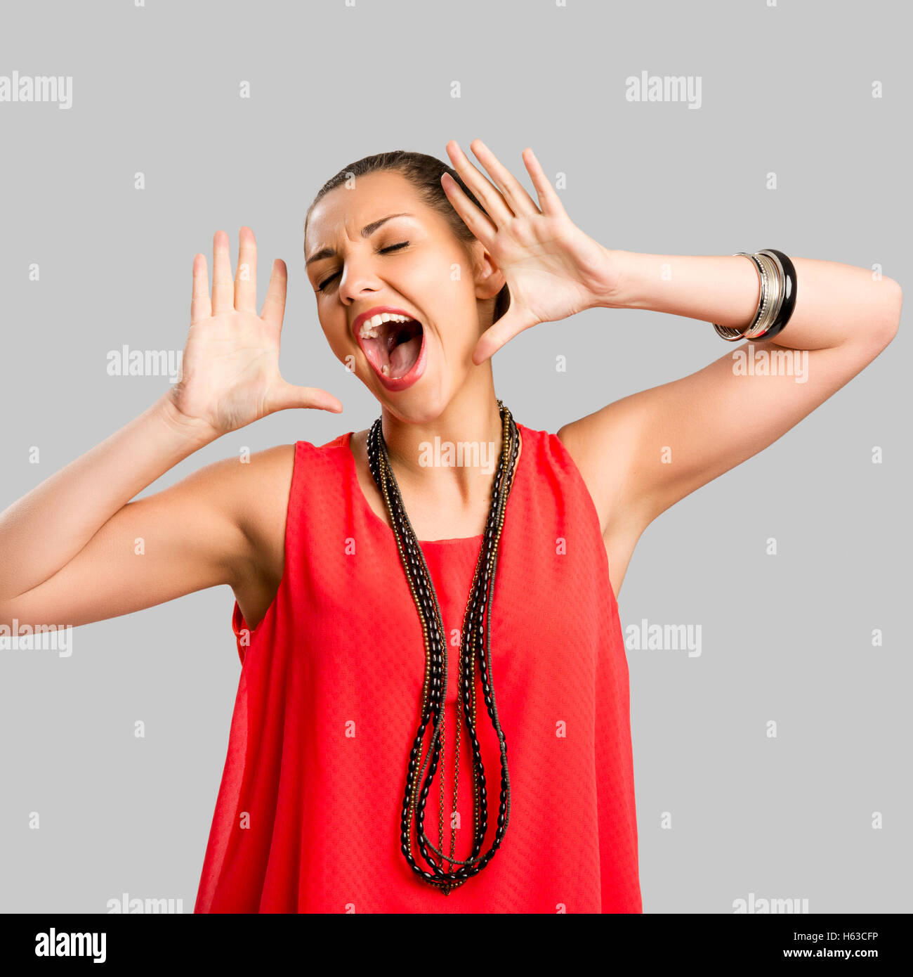 Portrait of a beautiful woman saying hello Stock Photo - Alamy