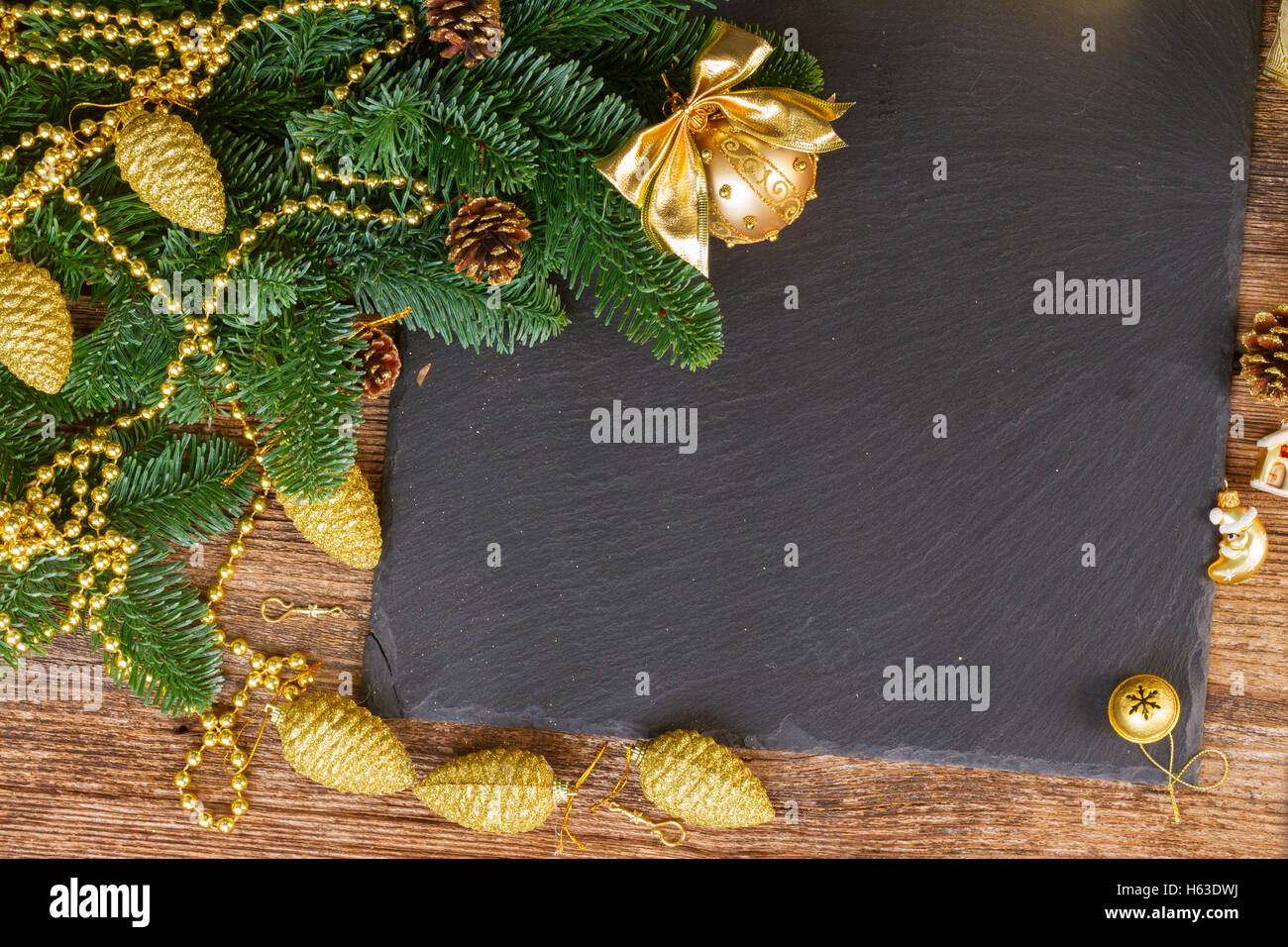 evergreen tree with golden ball Stock Photo - Alamy