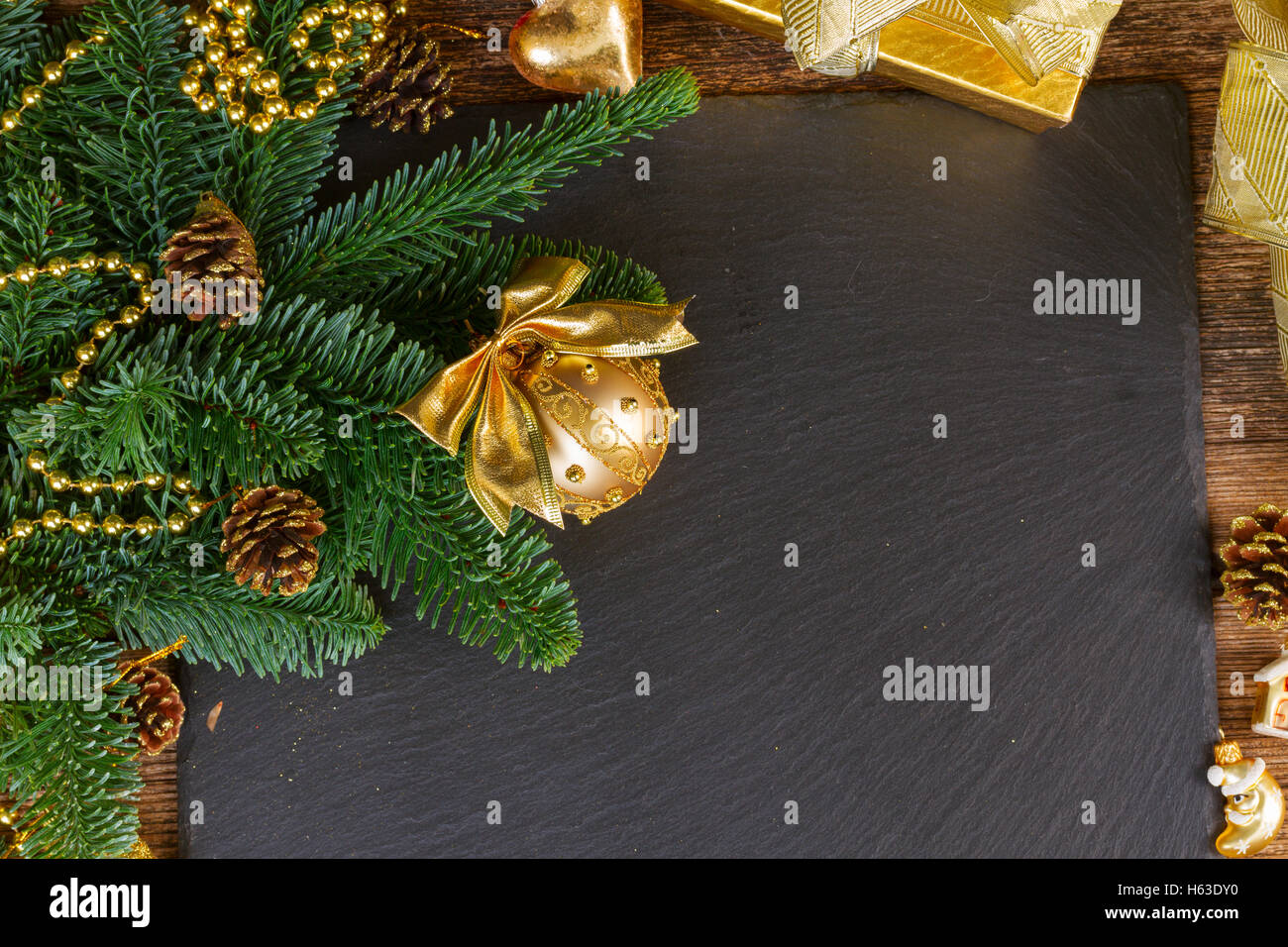 evergreen tree with golden ball Stock Photo - Alamy