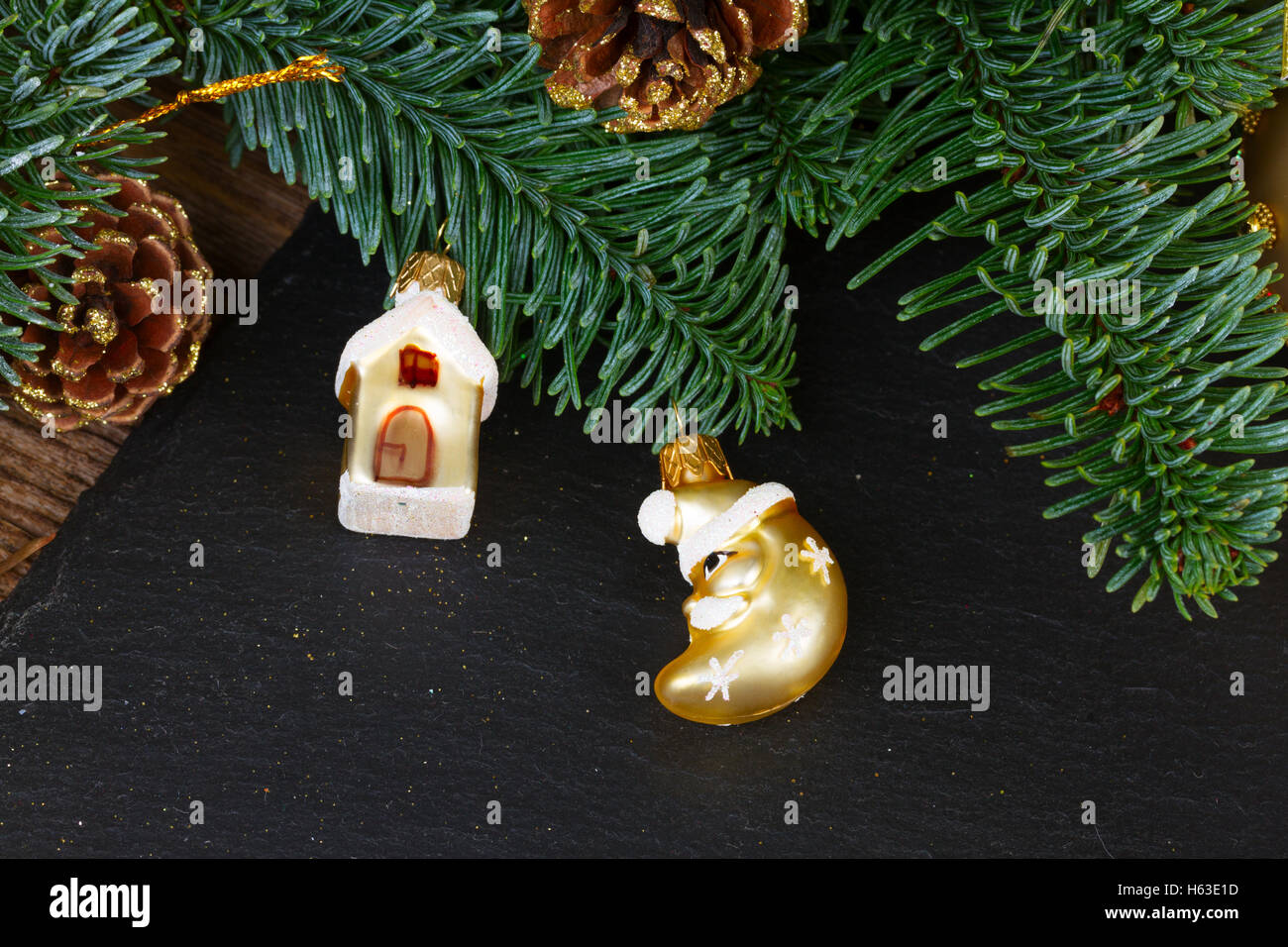 evergreen tree with golden ball Stock Photo - Alamy