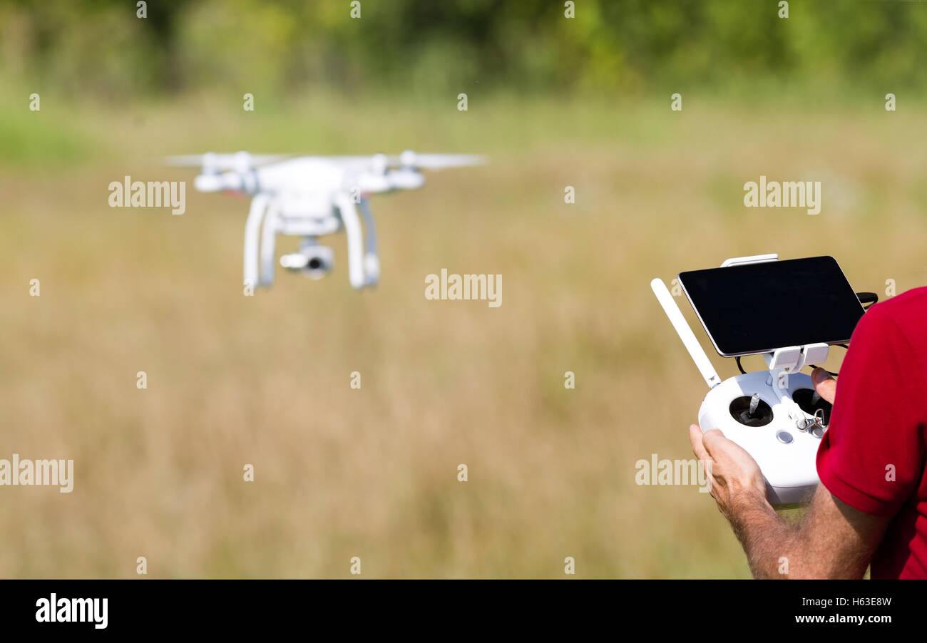 Quadcopter drone flying, technology and surveillance concepts Stock ...