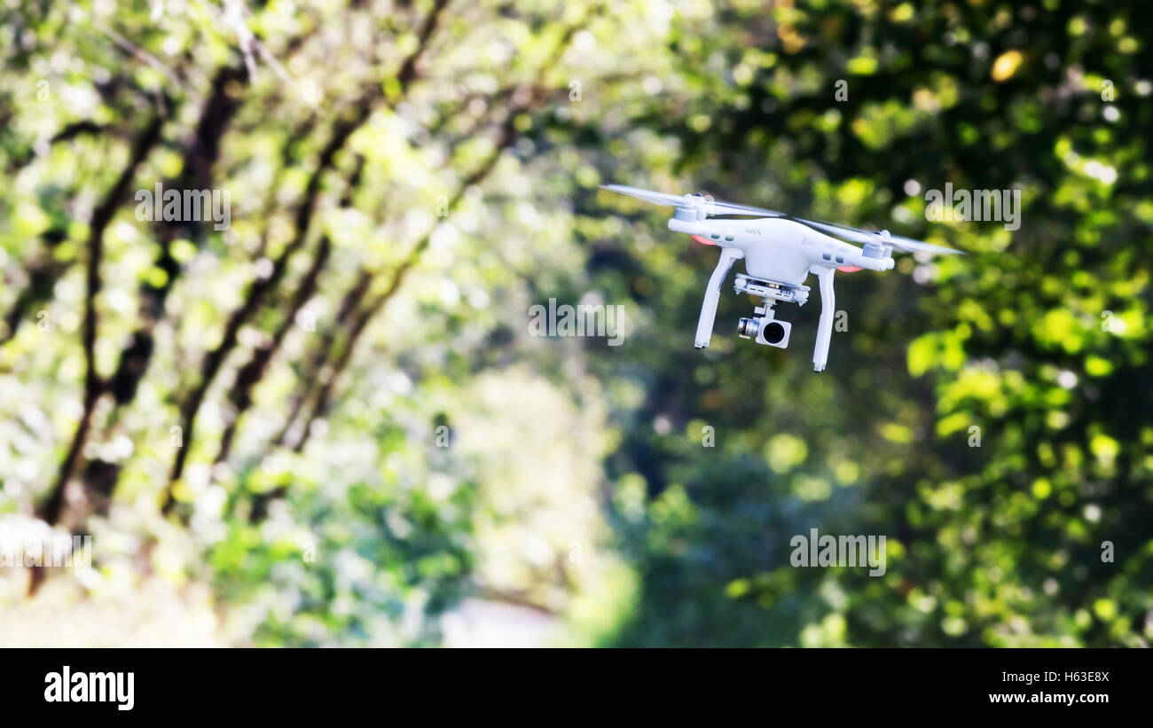 Quadcopter drone flying, technology and surveillance concepts Stock ...