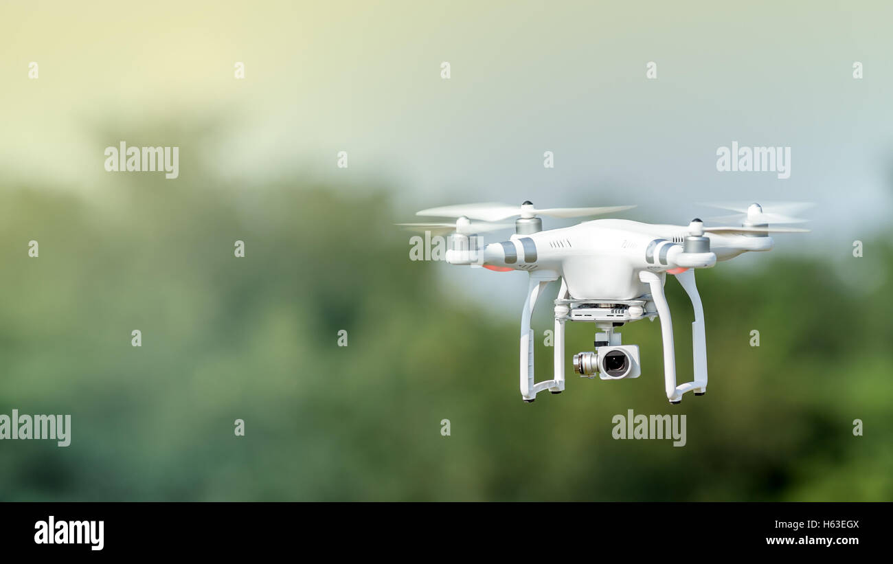 Quadcopter drone flying, technology and surveillance concepts Stock ...